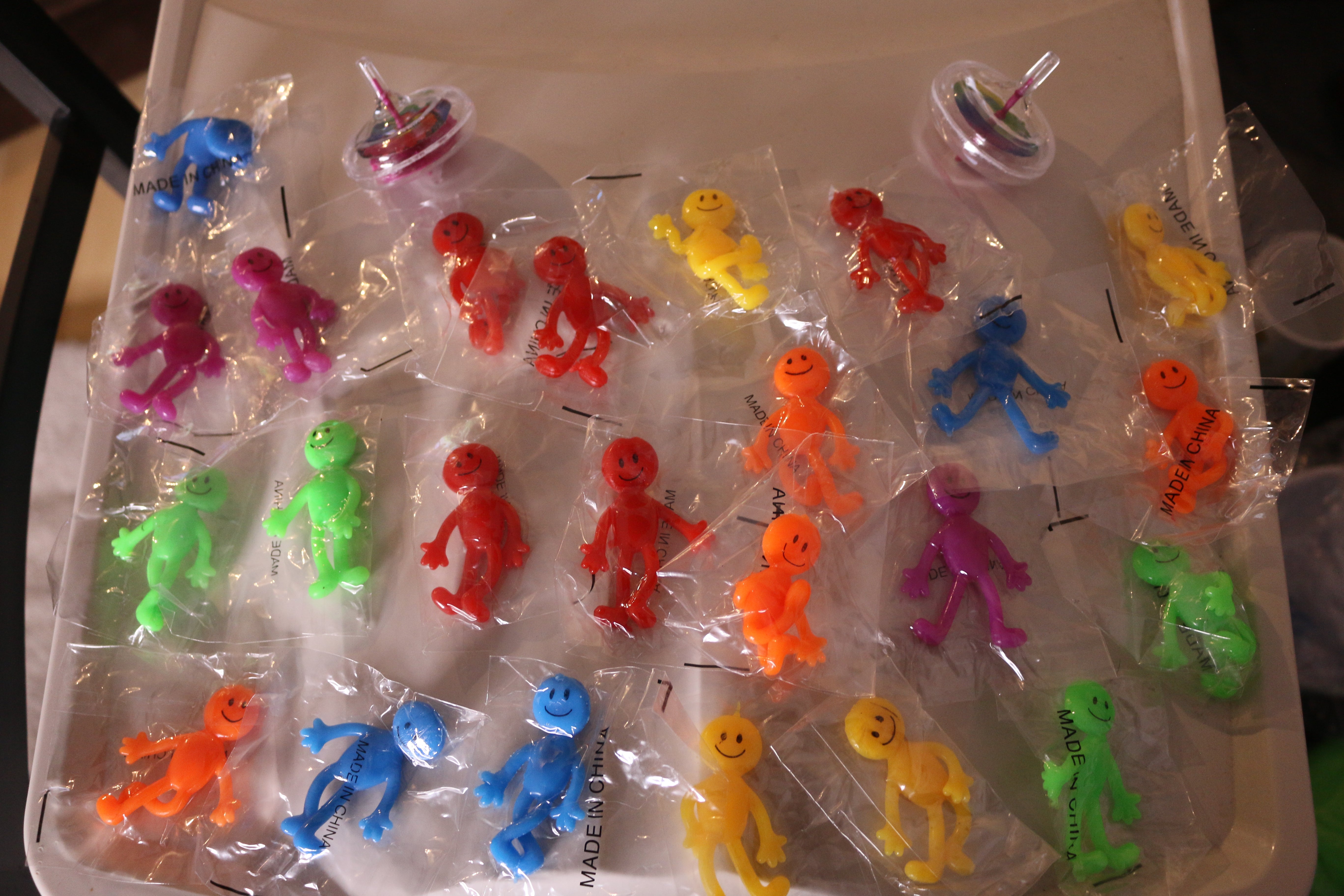 Set of expandable and foldable classroom toys, smiling figures colored ...